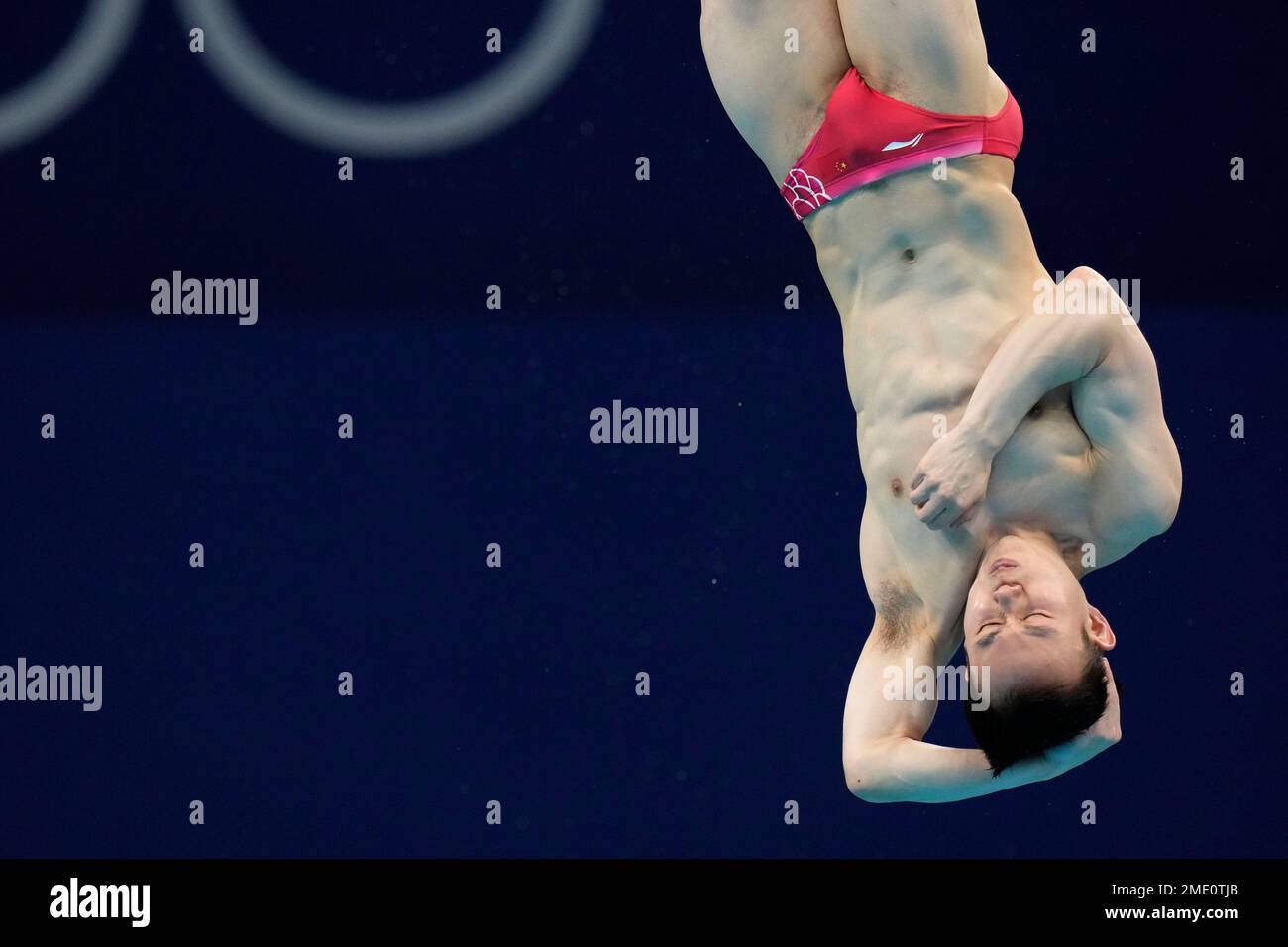 Xie Siyi of China competes in men's diving 3-meter springboard final at ...
