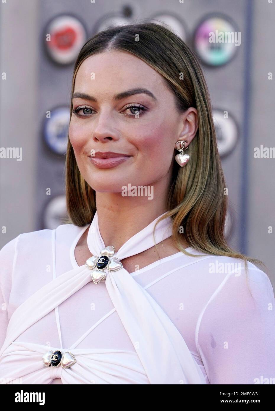 Margot Robbie, a cast member in "The Suicide Squad," poses with ...