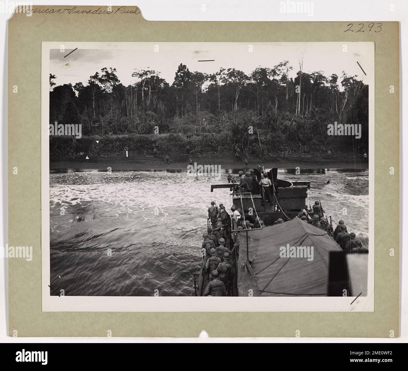 A Coast Guard combat photographer captures American troops charging ...