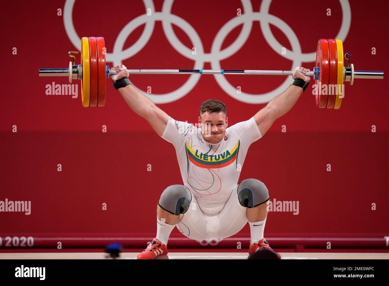 Arnas Sidiskis of Lithuania competes in the men's 109kg weightlifting ...