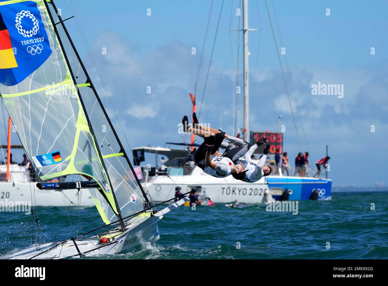 Germany's Erik Heil and Thomas Ploessel flip in to the water after ...