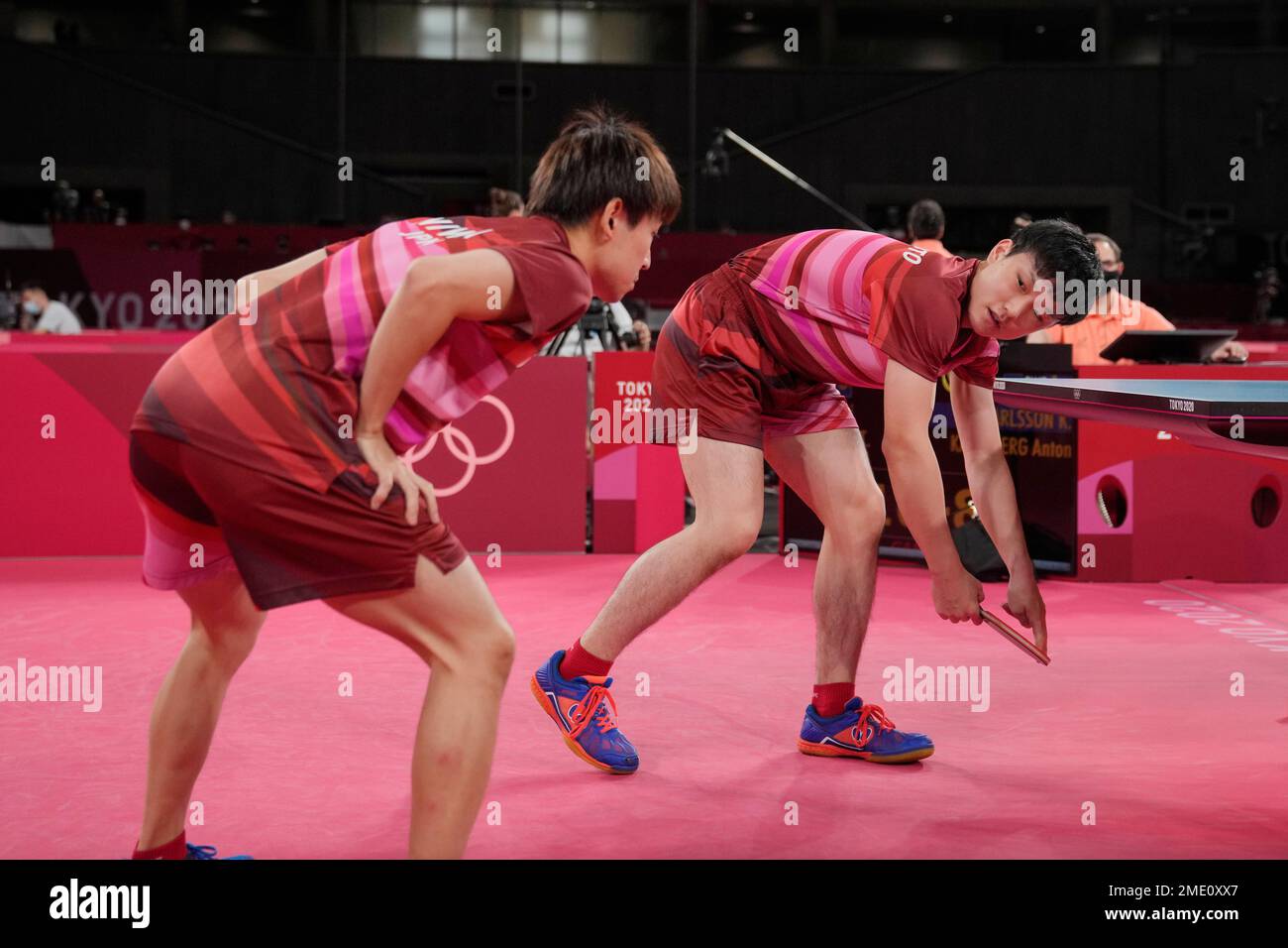 Japan's Tomokazu Harimoto, right, gives signal to Koki Niwa during the ...