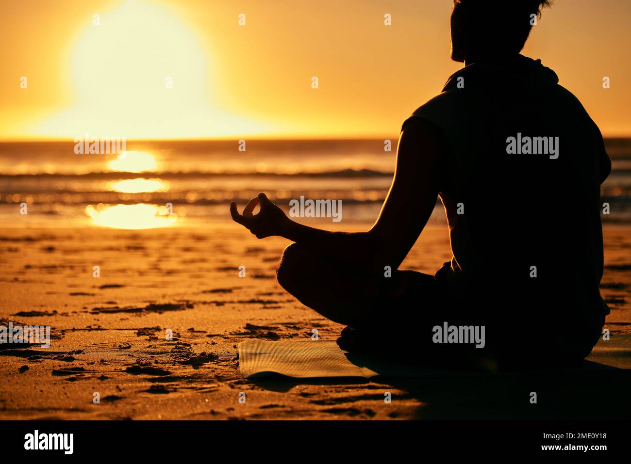 Meditation, lotus and silhouette of man at beach outdoors for health ...