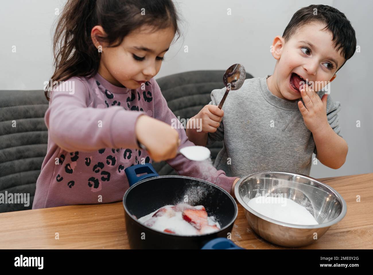 Portrait Of Happy Children Preparing Strawberry Jam, Eating Tasty ...