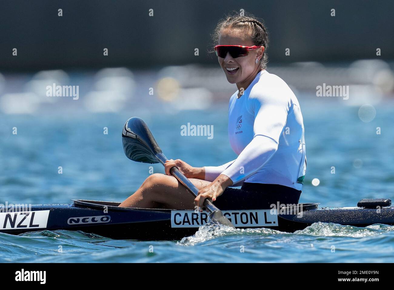 Lisa Carrington, of New Zealand, reacts after competing in the women's ...