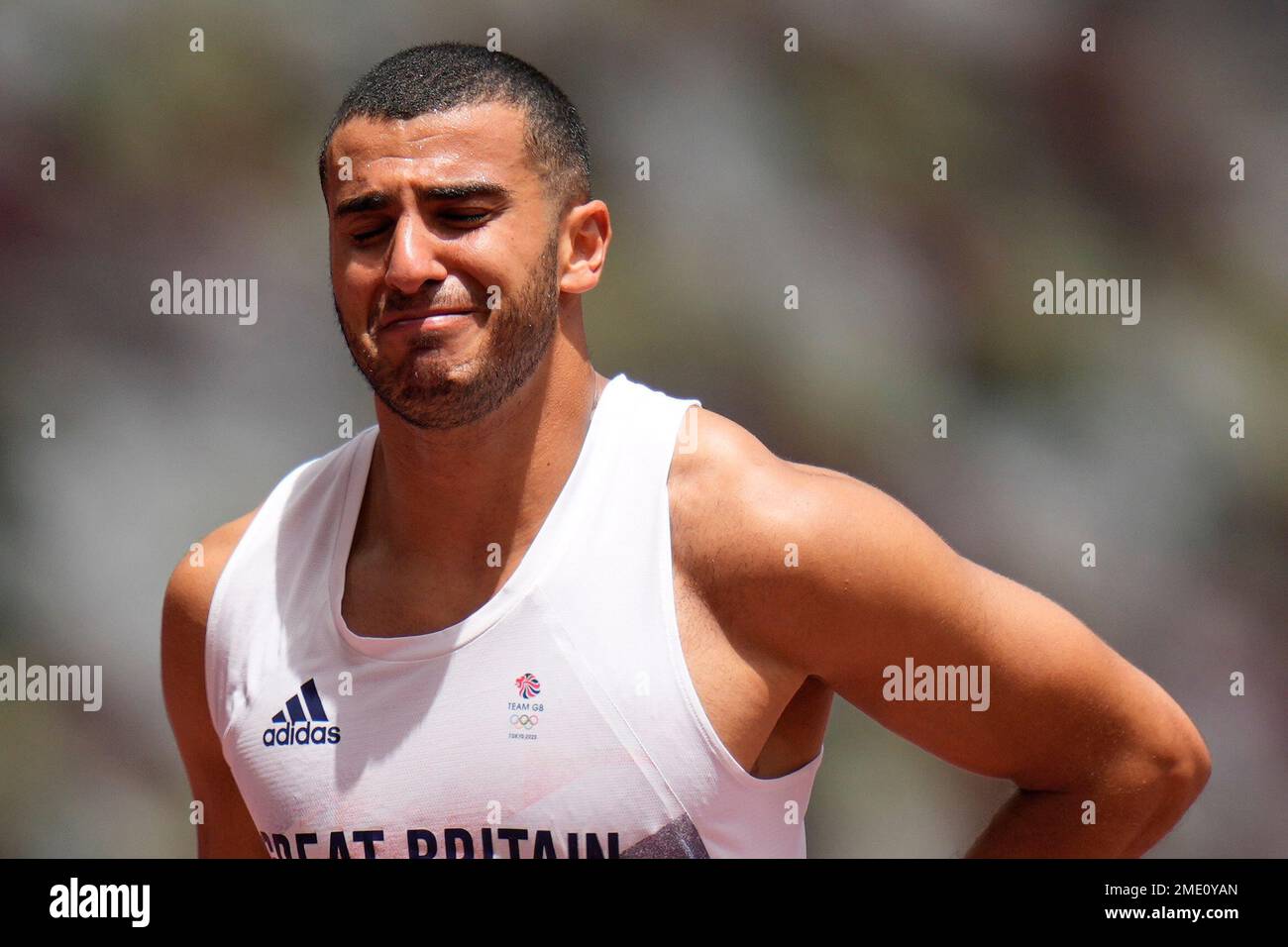 Adam Gemili, of Britain, walks from the track following his heat of the ...