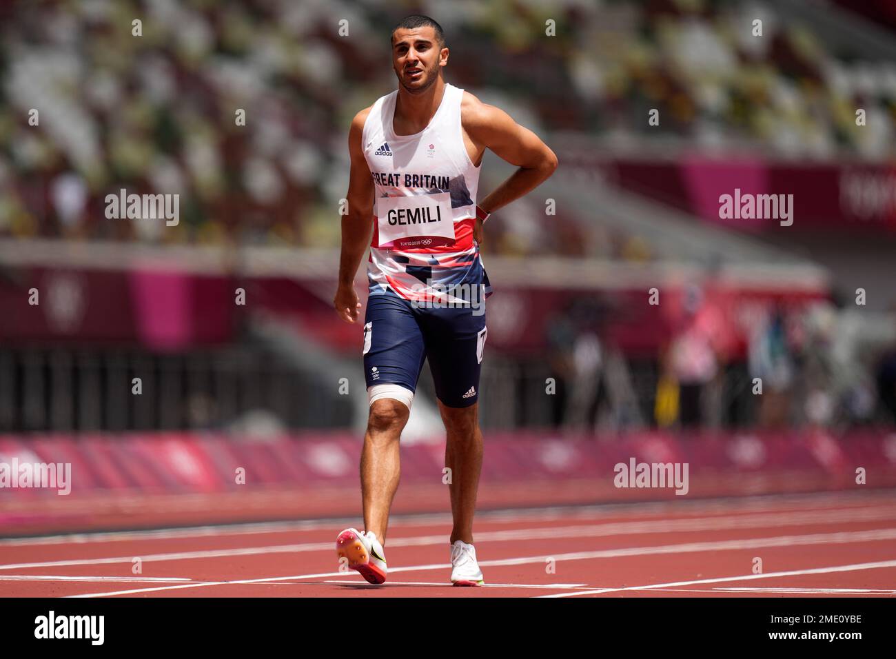 Adam Gemili, of Britain, walks from the track following his heat of the ...
