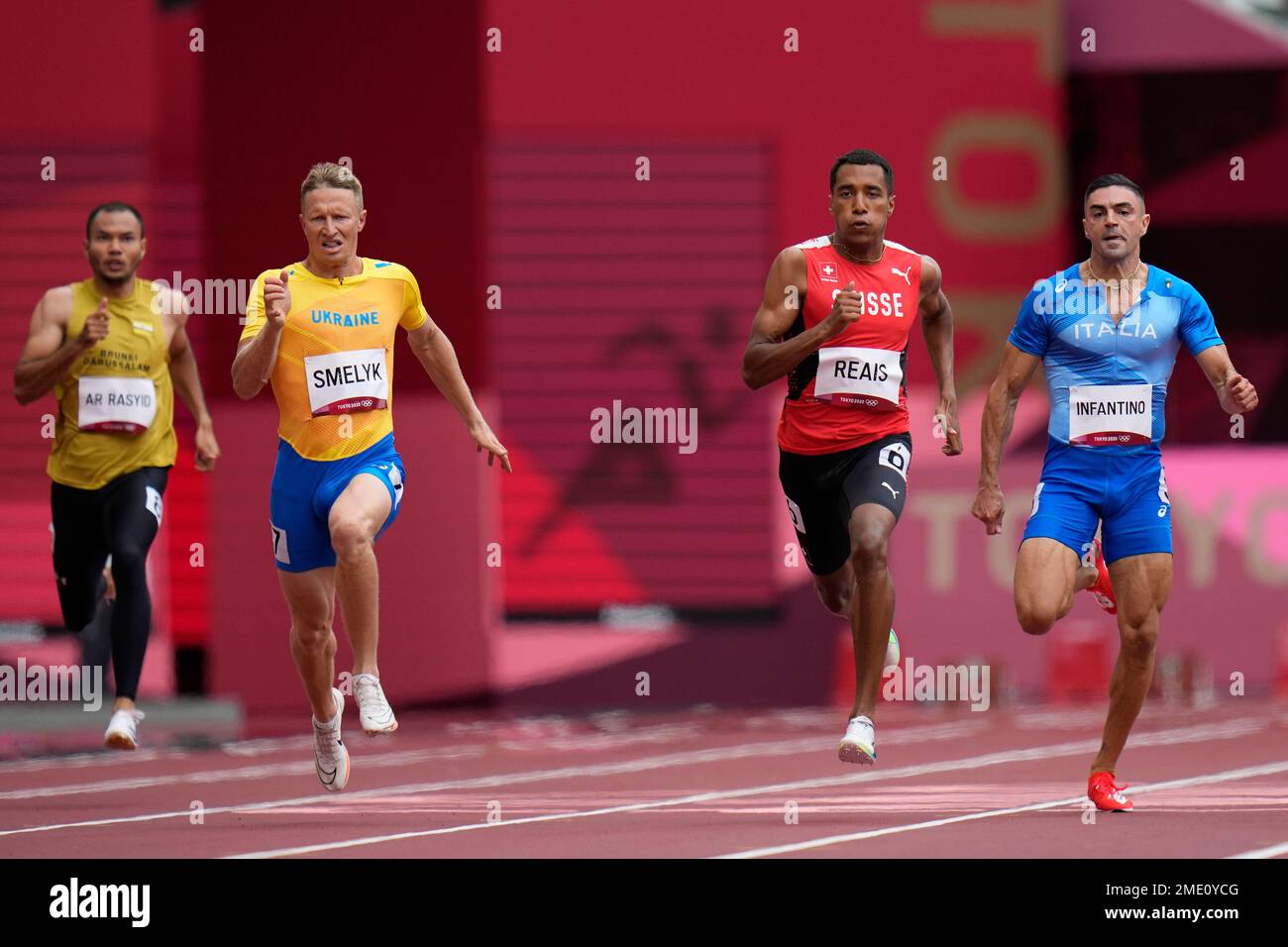 Athletes compete in a heat of the men's 200-meters at the 2020 Summer ...