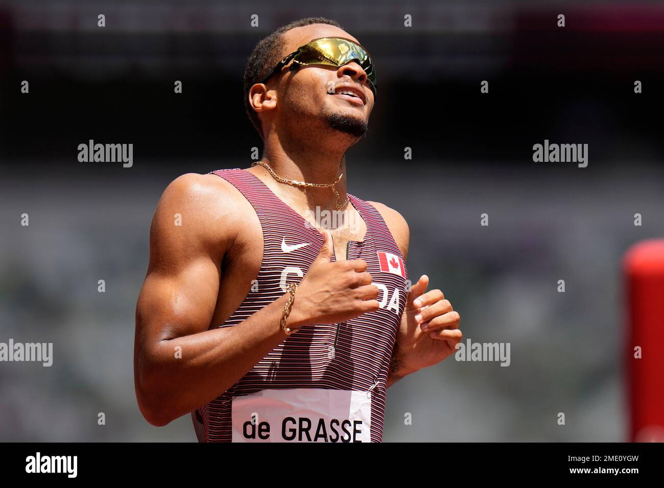 Andre De Grasse, of Canada, competes in a heat of the men's 200-meters ...