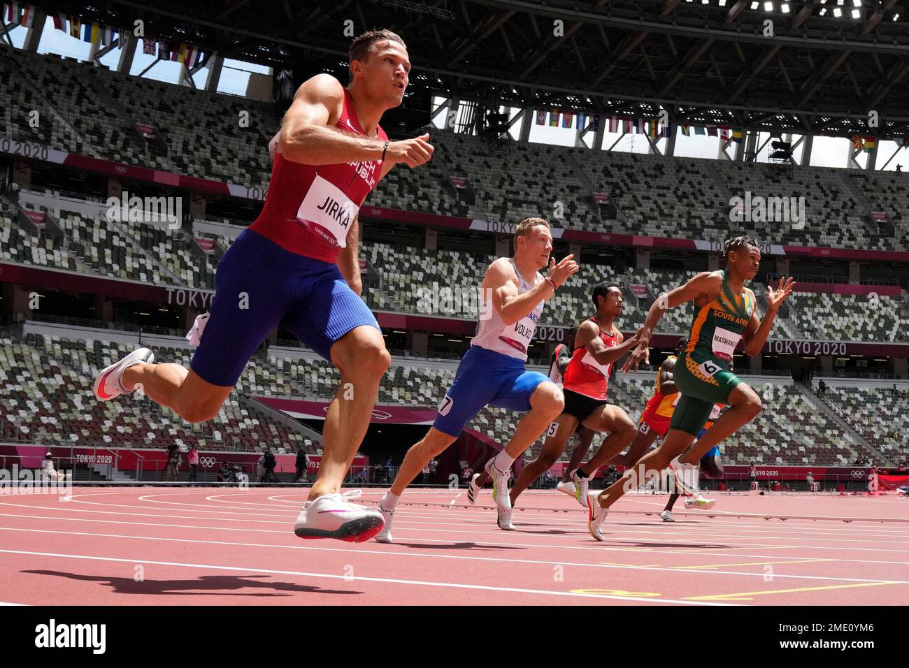 Jan Jirka, left, of Czech Republic, competes in a heat of the men's 200 ...