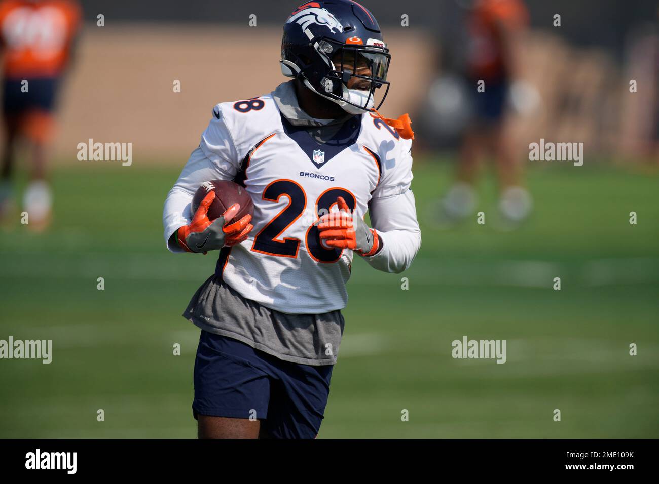 Denver Broncos running back Royce Freeman (28) takes part in drills at ...