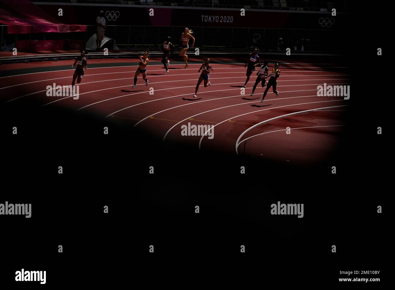 Runners compete in a heat of the women's 400-meters at the 2020 Summer ...