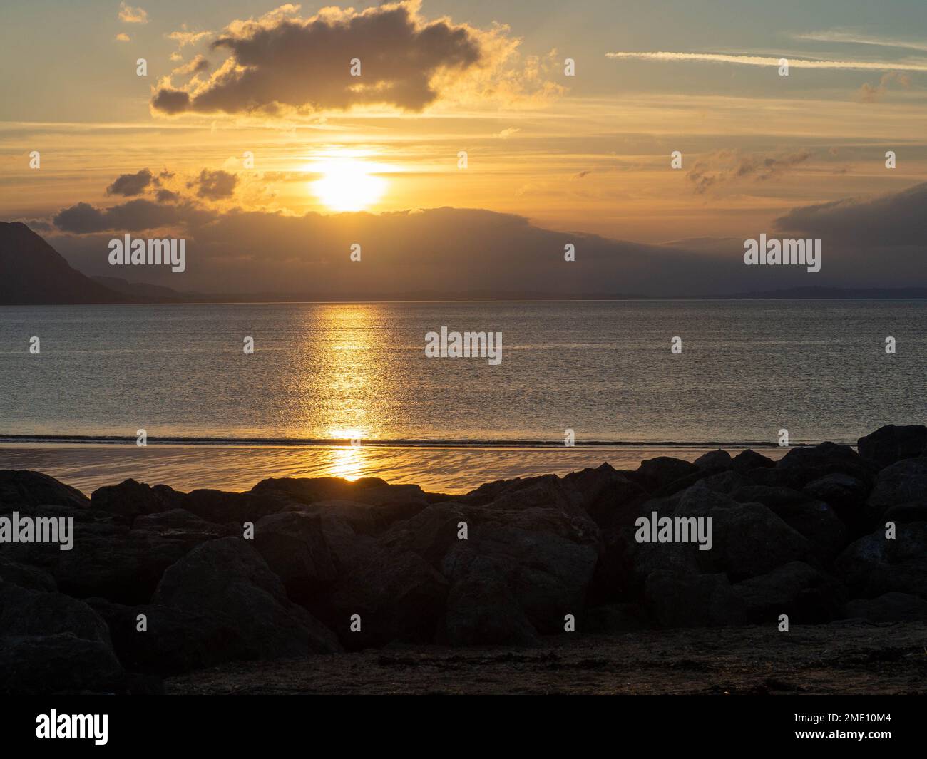 Sunset over the Irish sea at Llandudno Beach, North Wales Stock Photo ...