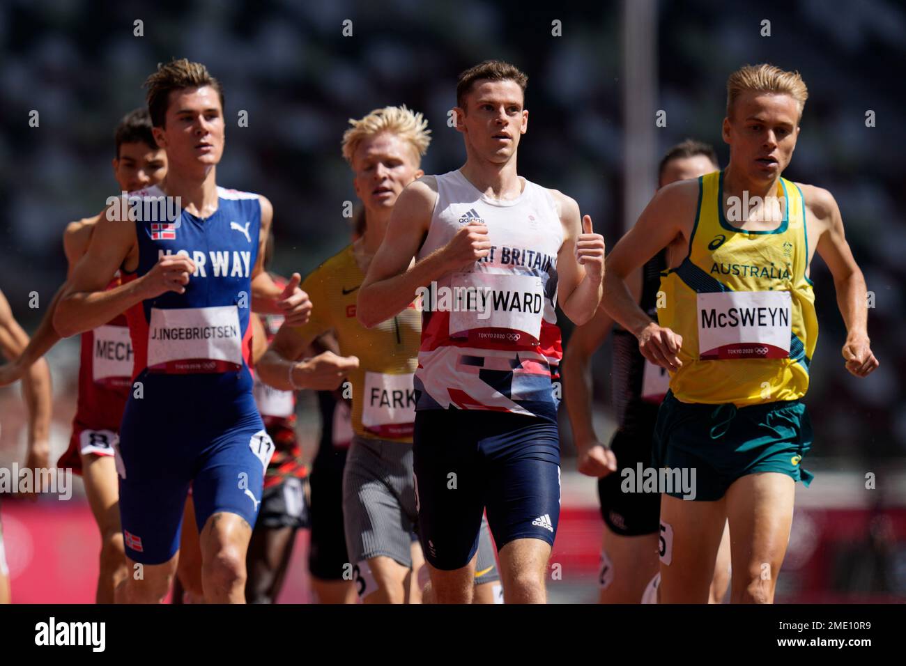 Jake Heyward, of Britain, leads the field to the finish line in his ...