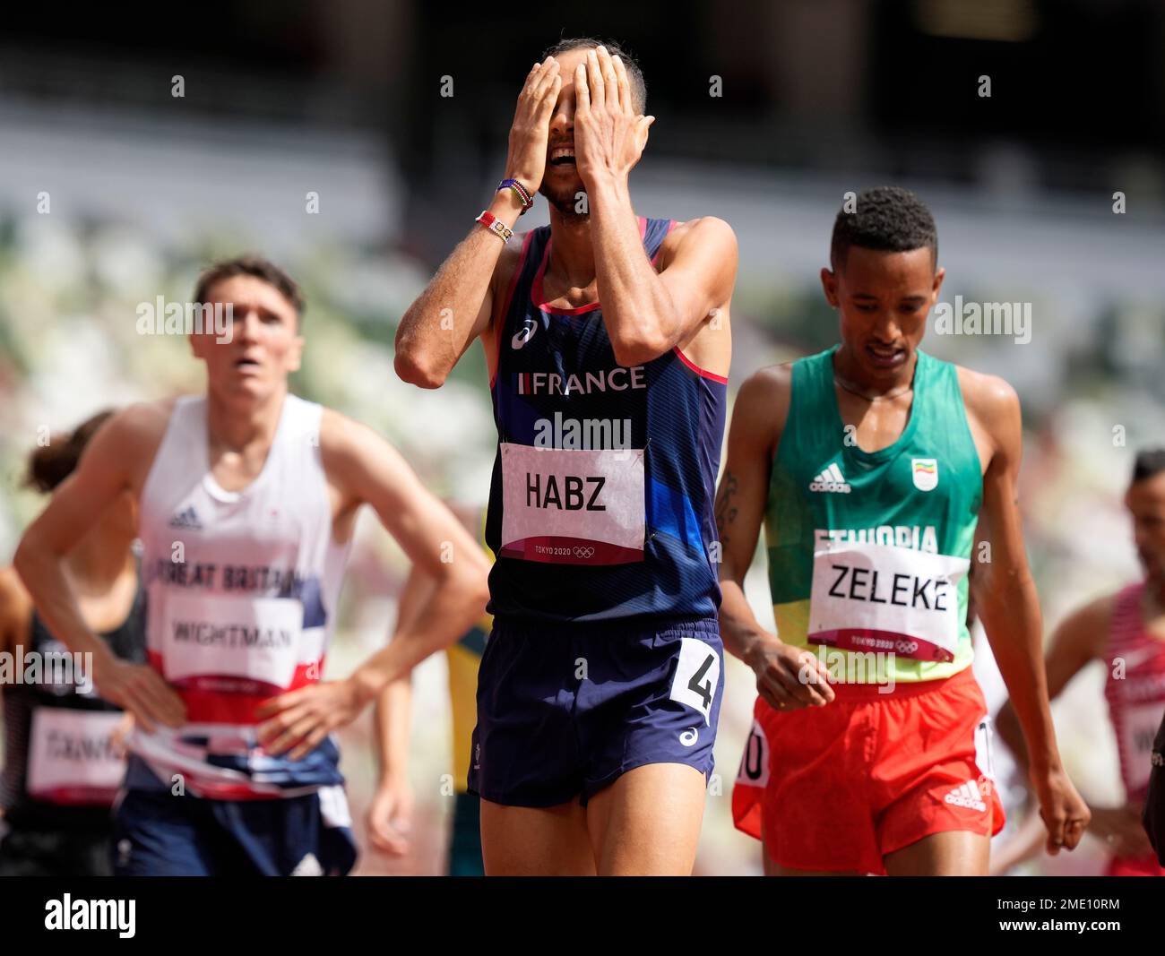 Azeddine Habz, of France reacts after finishing a men's 1,500-meter ...