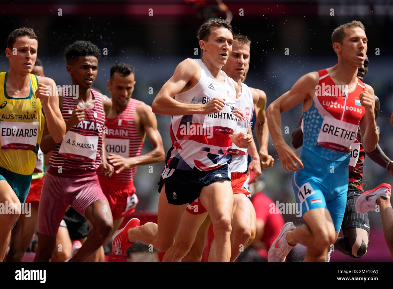 Runners compete in a heat of the men's 1,500-meters at the 2020 Summer ...