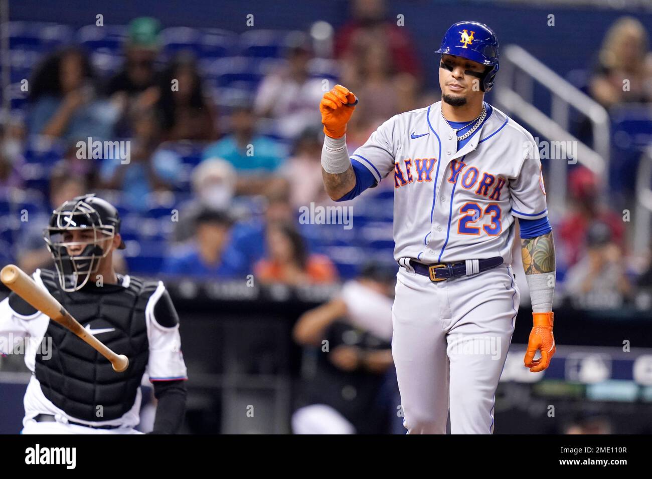 New York Mets' Javier Baez tosses his bat after drawing a walk during ...