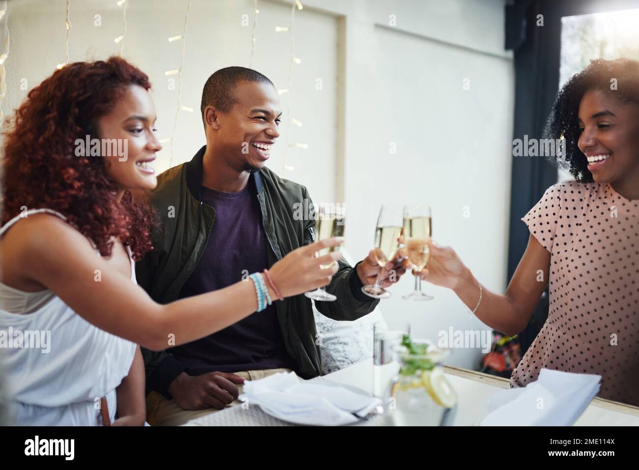 Getting together to celebrate friendship. a group of young friends ...