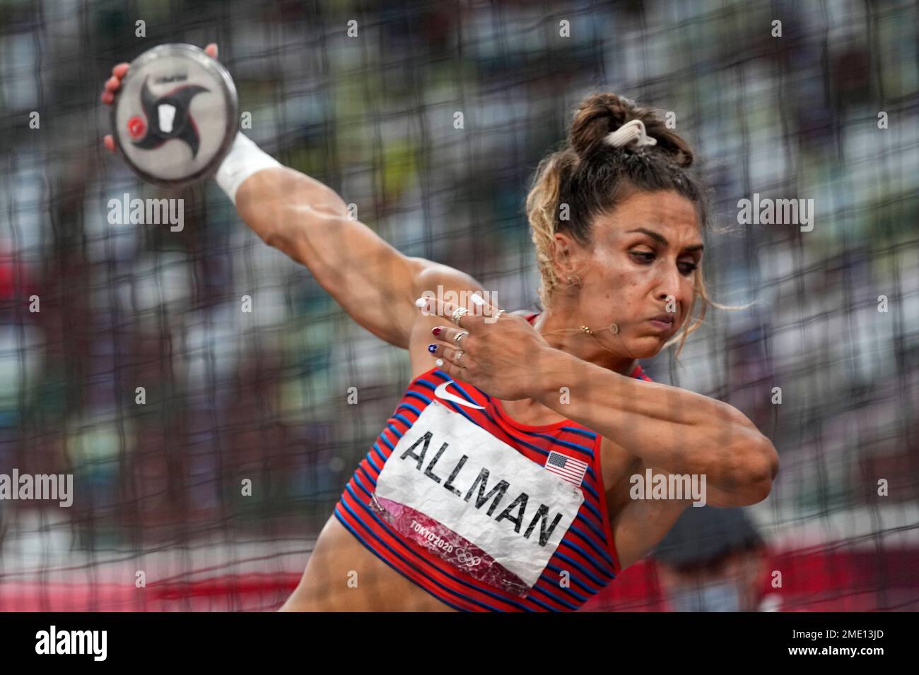Valarie Allman, of the United States, competes in the women's discus ...