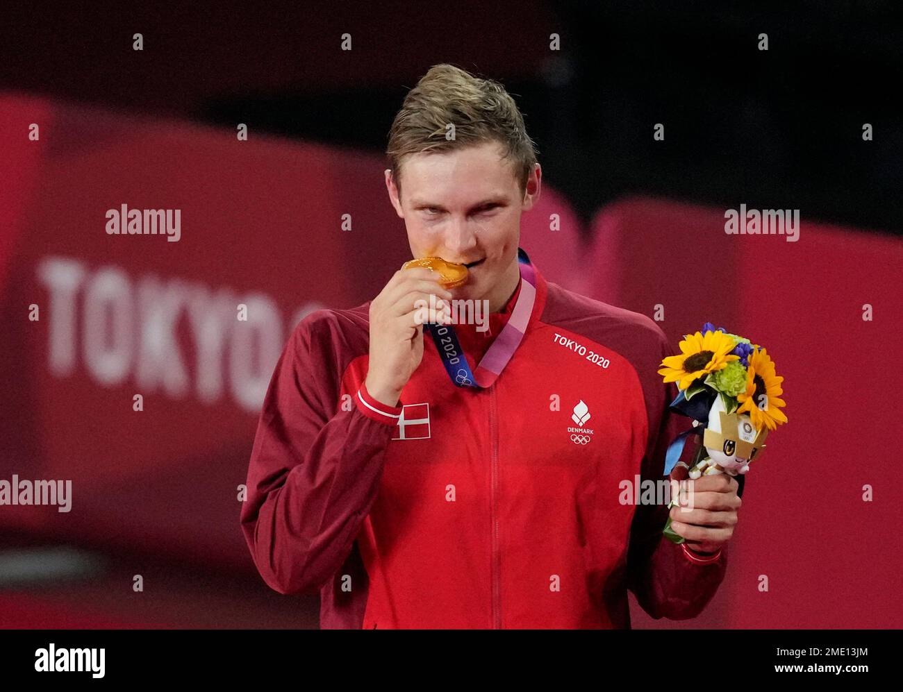 Gold medalist Denmark's Victor Axelsen celebrates during the medal ...