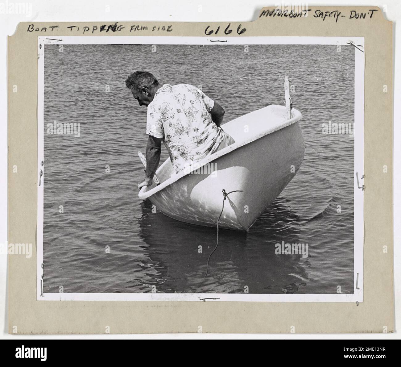 A lone boatman risks overturning his rowboat while searching for a lost ...