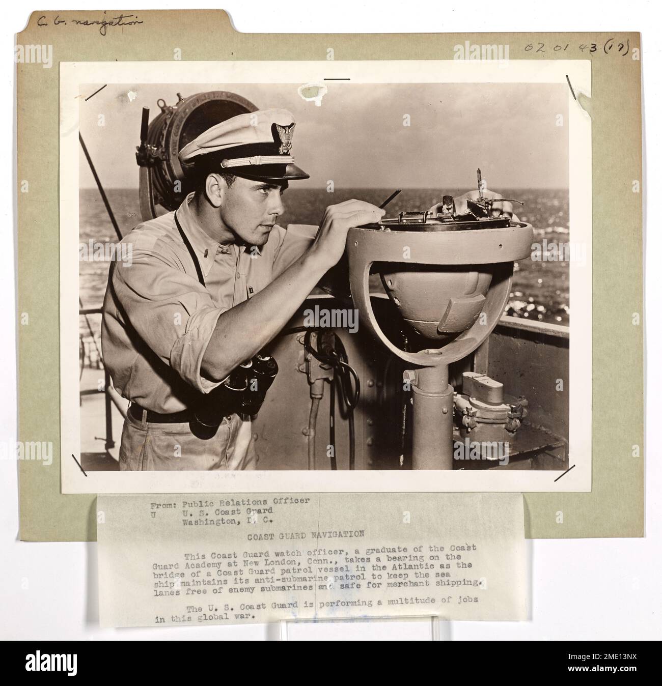 A Coast Guard watch officer on a patrol vessel in the Atlantic takes a ...