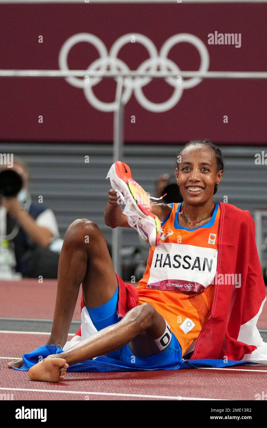 Sifan Hassan, of the Netherlands, celebrates after winning the gold ...