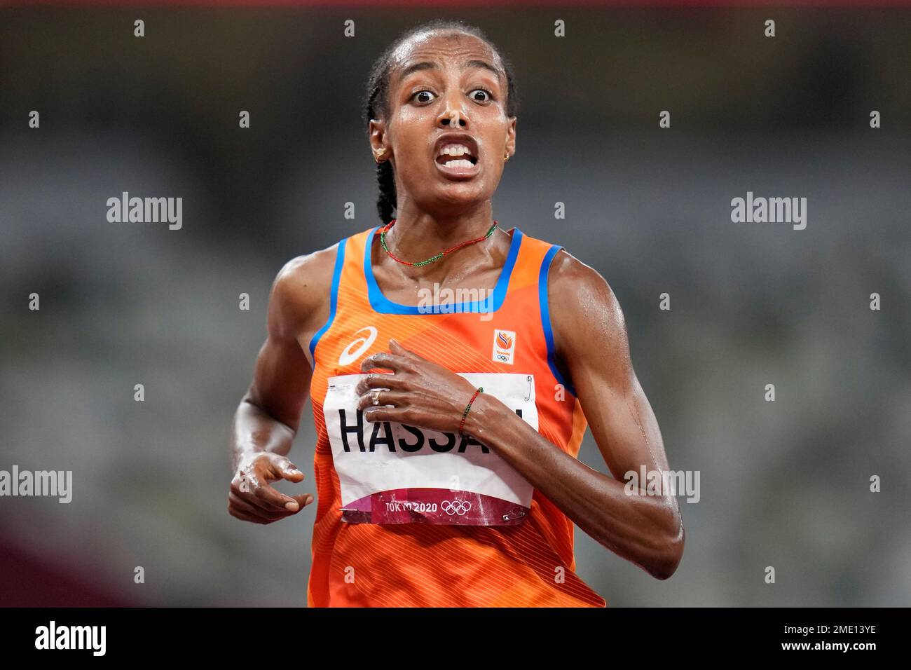 Sifan Hassan, of the Netherlands, reacts as she crosses the finish line to win the women's 5,000 ...