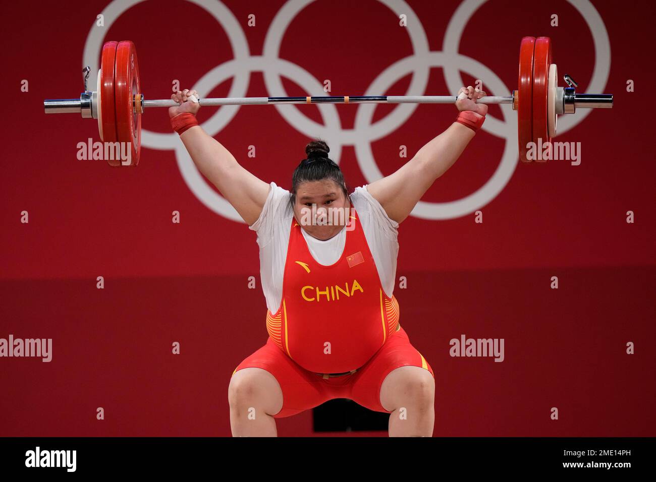Li Wenwen of China competes in the women's +87kg weightlifting event at ...