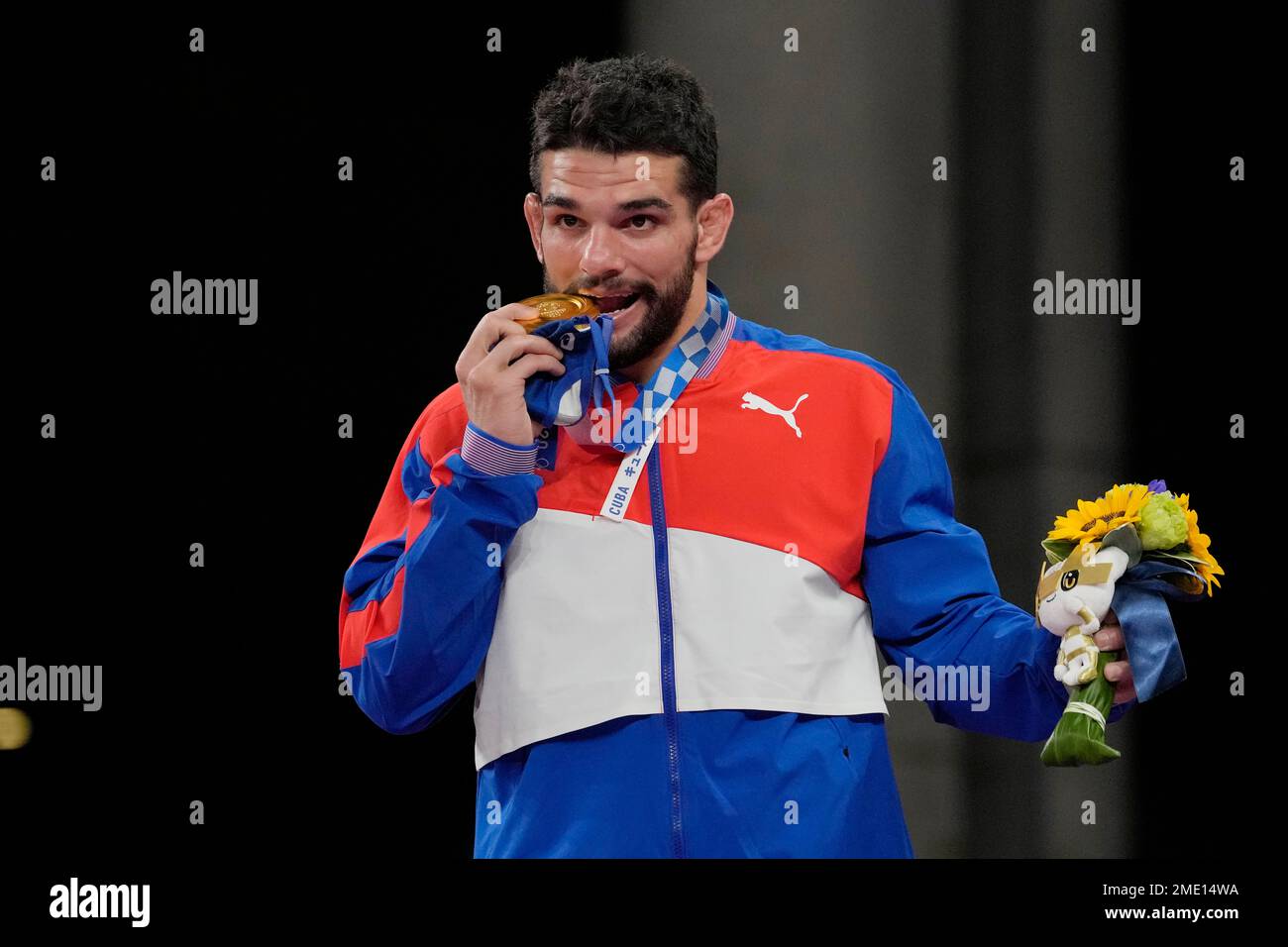 Gold medalist, Cuba?s Luis Orta Sanchez celebrates on the podium during ...