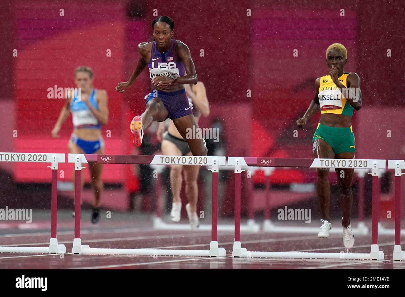 Dalilah Muhammad, of the United States, competes in a semifinal of the ...