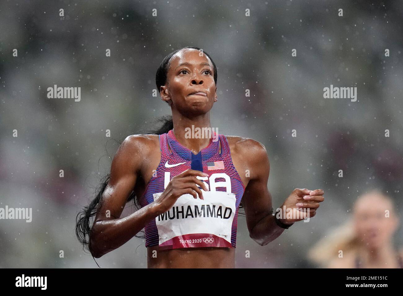 Dalilah Muhammad, of the United States, competes in a semifinal of the ...