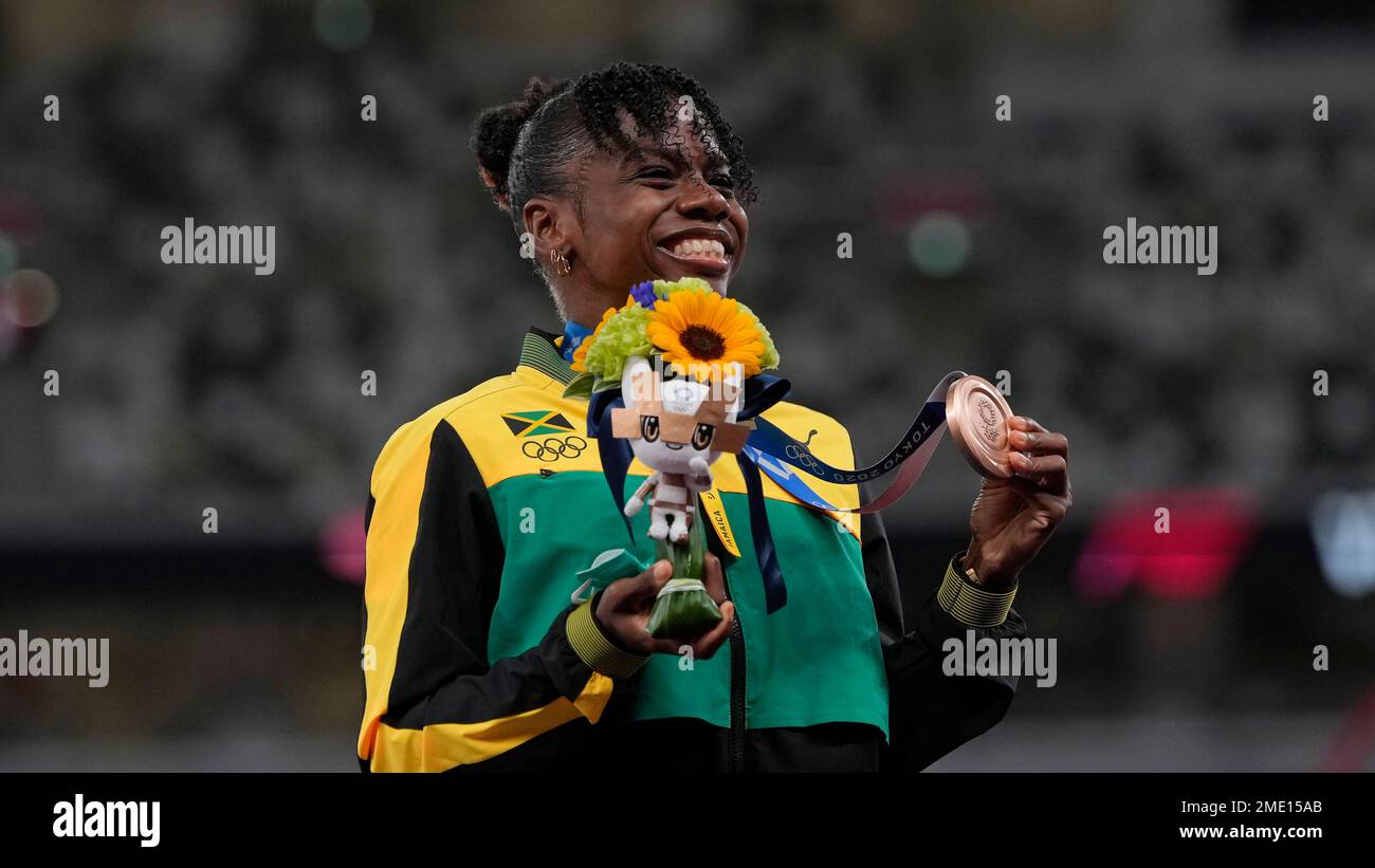 Megan Tapper, of Jamaica, poses with her bronze medal for the women's ...