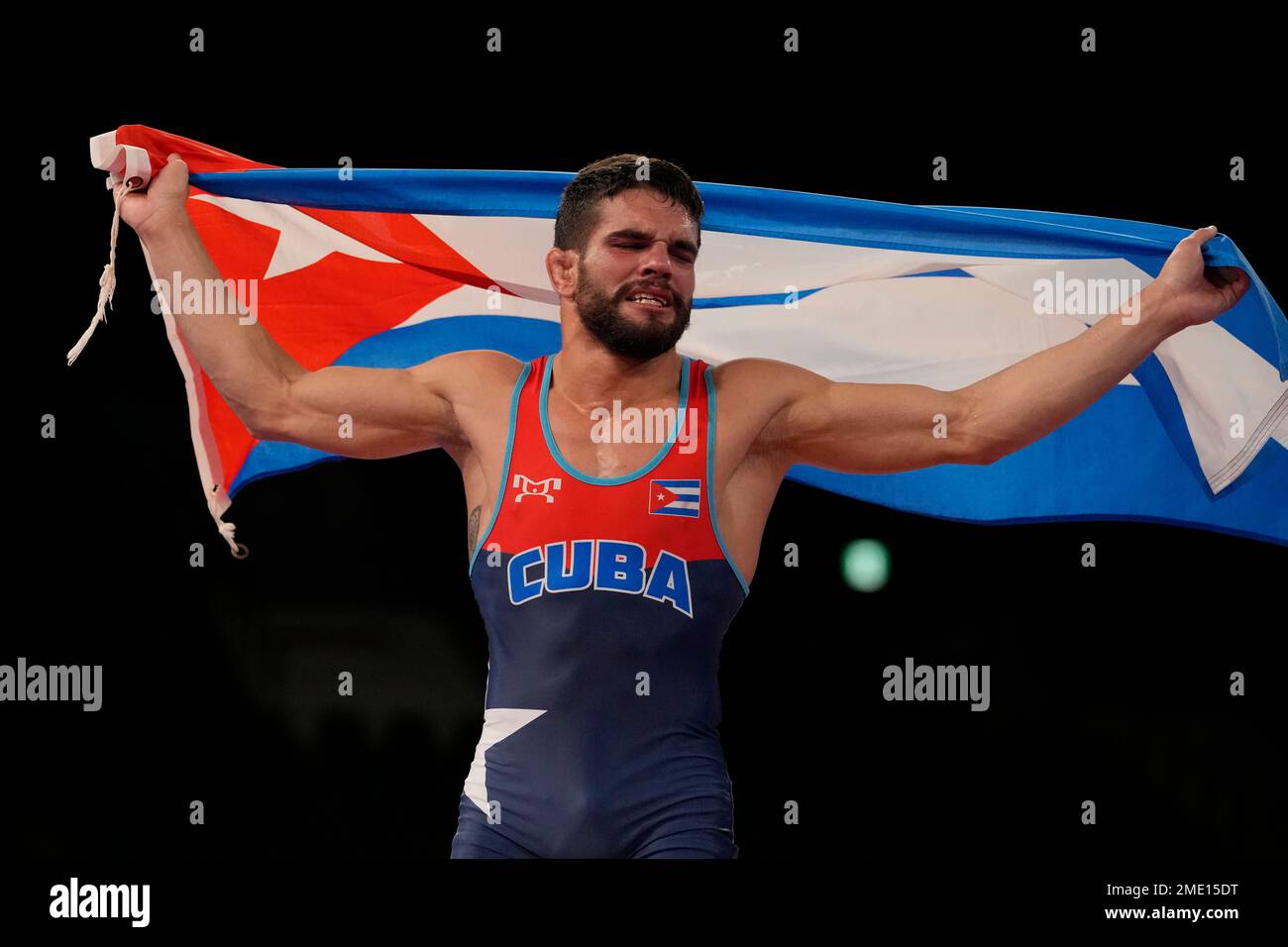 Cuba's Luis Orta Sanchez celebrates defeating Japan's Kenichiro Fumita ...