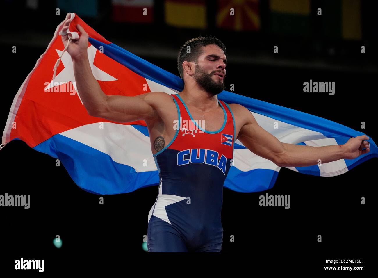 Cuba's Luis Orta Sanchez celebrates defeating Japan's Kenichiro Fumita ...
