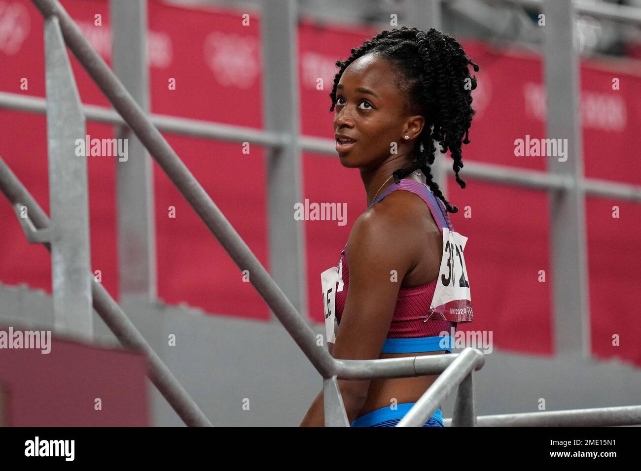 Anavia Battle, of the United States, reacts after a semifinal of the ...