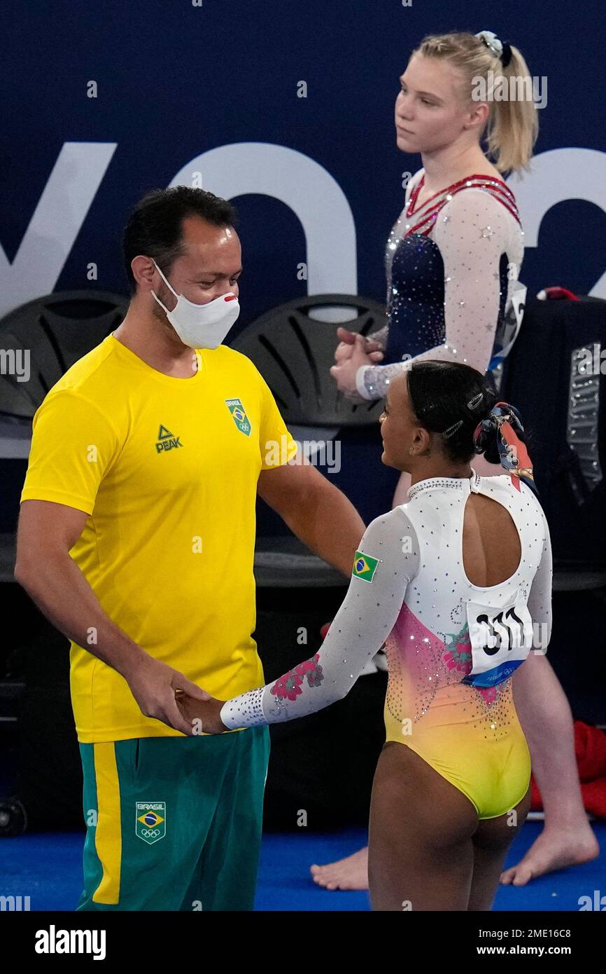 Rebeca Andrade, of Brazil, greets her coach after performing on the ...