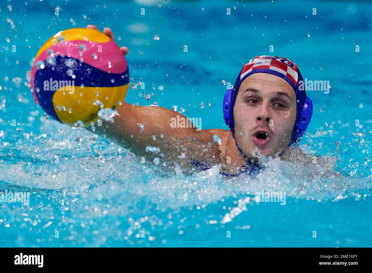 Croatia's Loren Fatovic moves the ball during a preliminary round men's ...