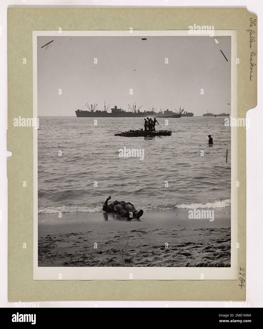 This image depicts a fallen American soldier on the beach in Southern ...