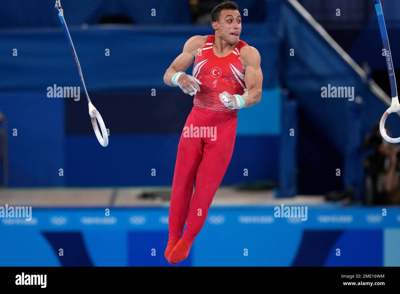 Adem Asil, of Turkey, performs on the rings during the artistic ...