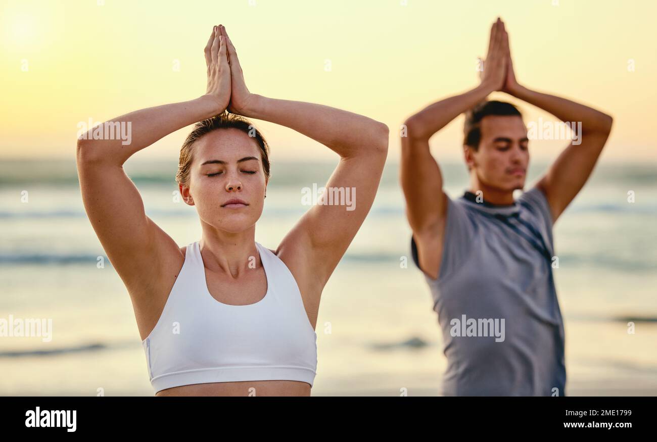 Hands beach ocean pray hi-res stock photography and images - Alamy