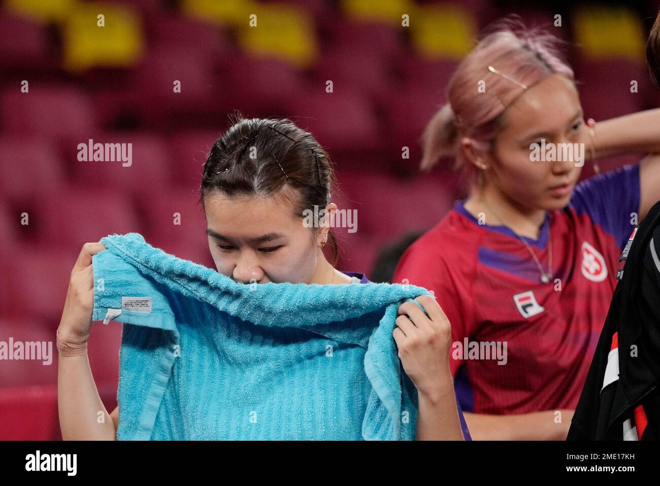 Hong Kong's Minnie Soo Wai-yam, right, and Lee Ho-ching react during ...