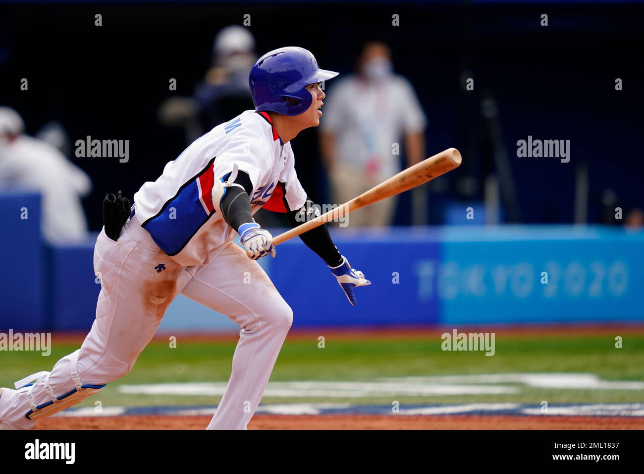 South Korea's Hyeseong Kim follows through after hitting game-winning ...