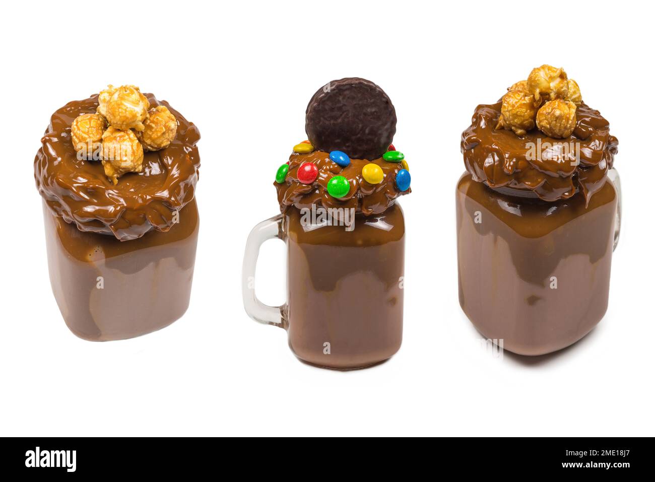 Chocolate milkshake with whipped cream, cookies, waffles, served in ...