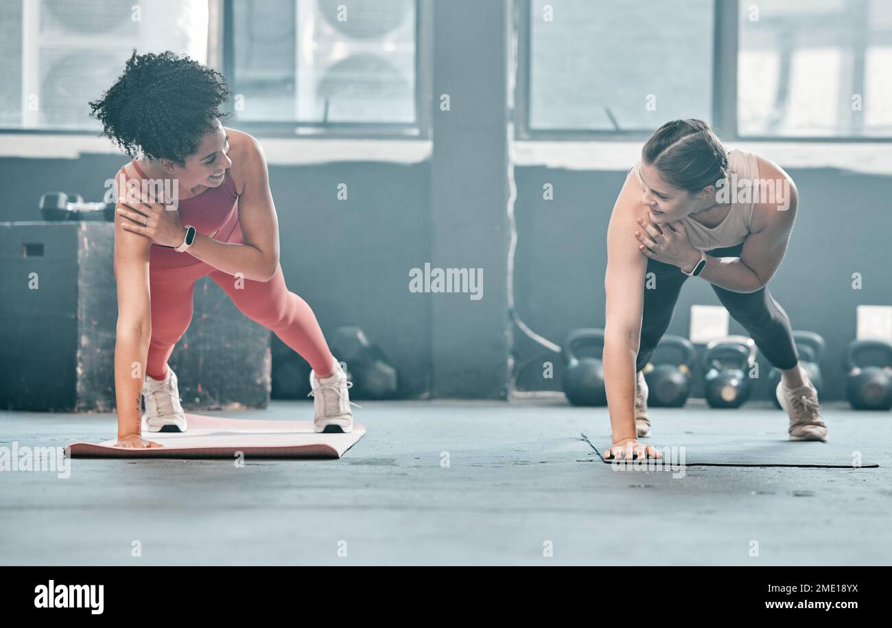 Gym floor, health and training woman doing arm plank exercise ...