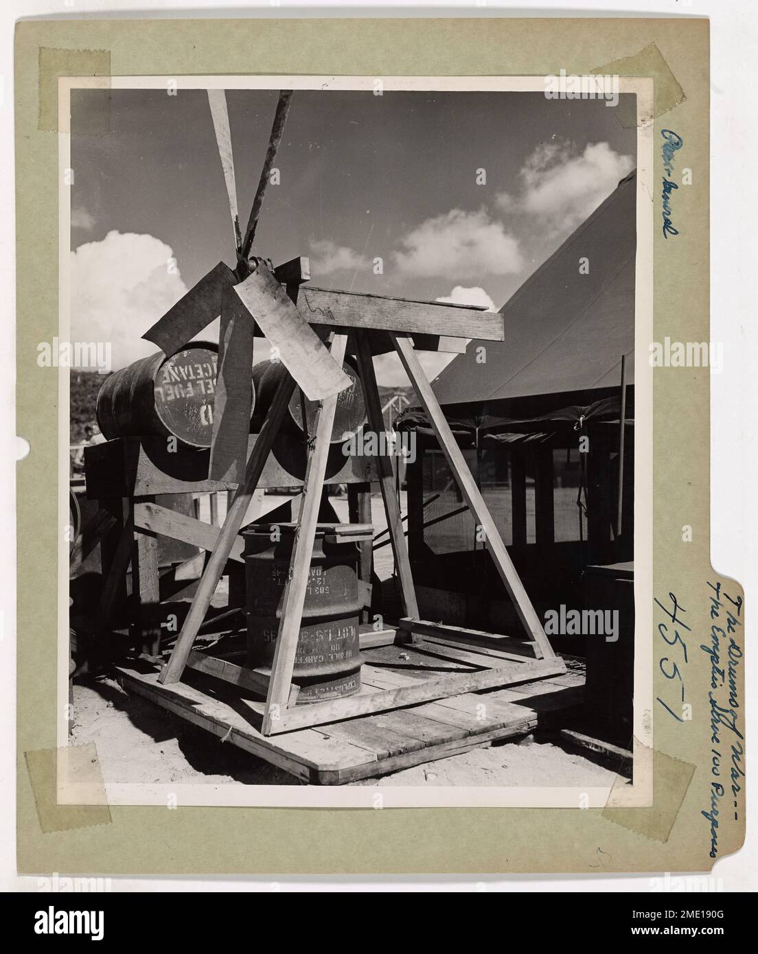 Coast Guardsmen make use of empty oil drums for a variety of practical ...
