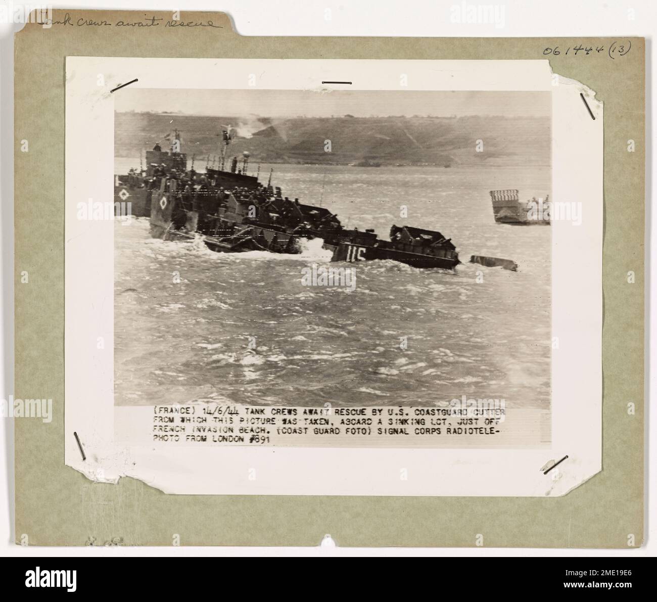 Tank crews aboard a sinking LCT (Landing Craft Tank) off the French ...