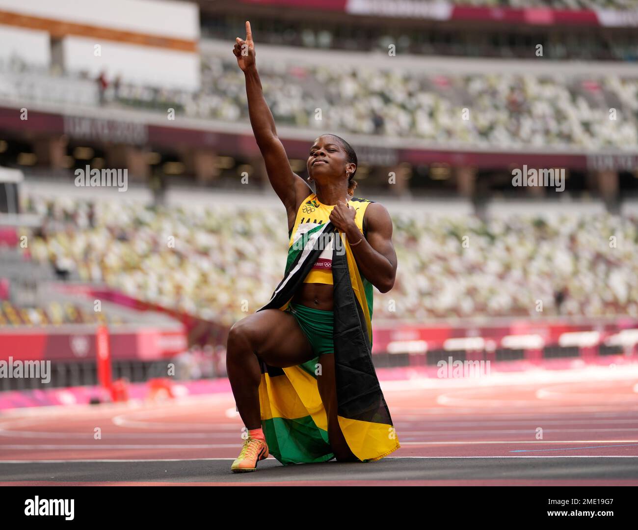 Megan Tapper, of Jamaica celebrates after winning the bronze medal in ...