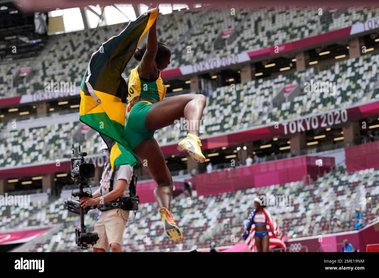 Megan Tapper, of Jamaica, reacts after winning the bronze medal in the ...