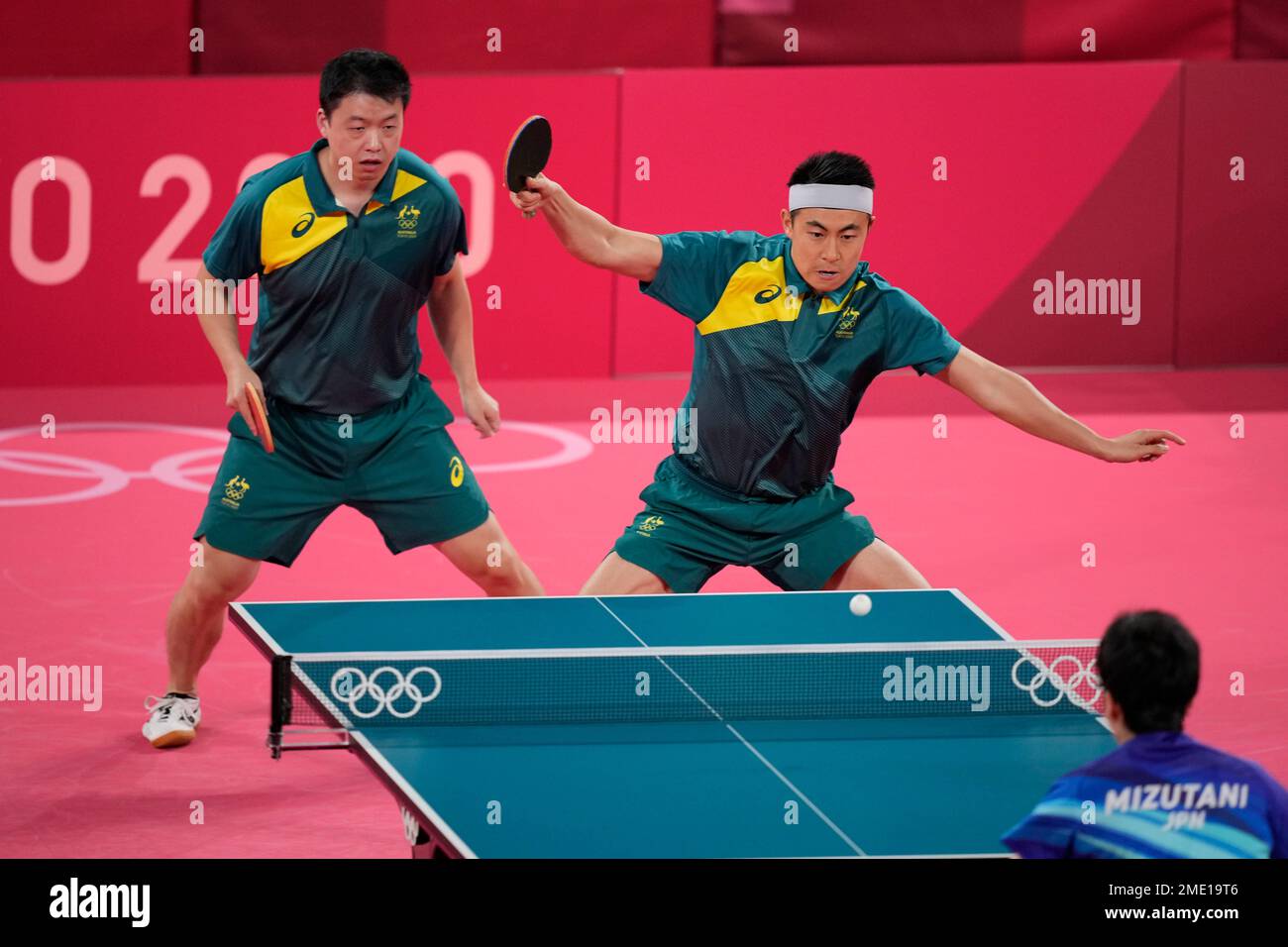 Australia's Hu Heming and Yan Xin compete during the table tennis men's ...